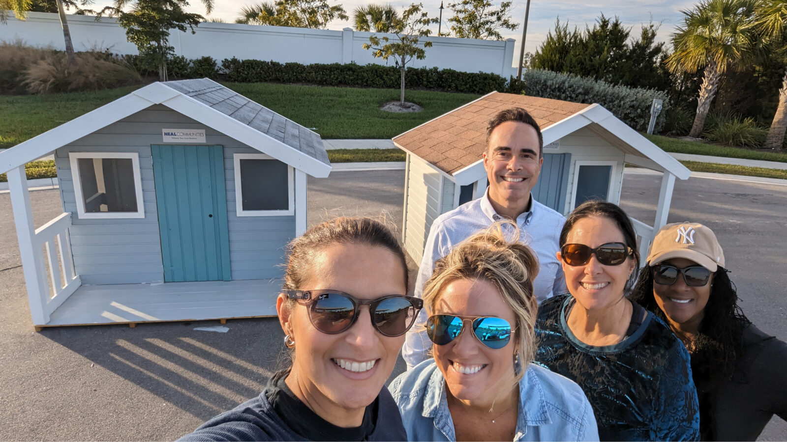 Neal Communities and Neal Signature Homes Employees Paint Playhouses ...